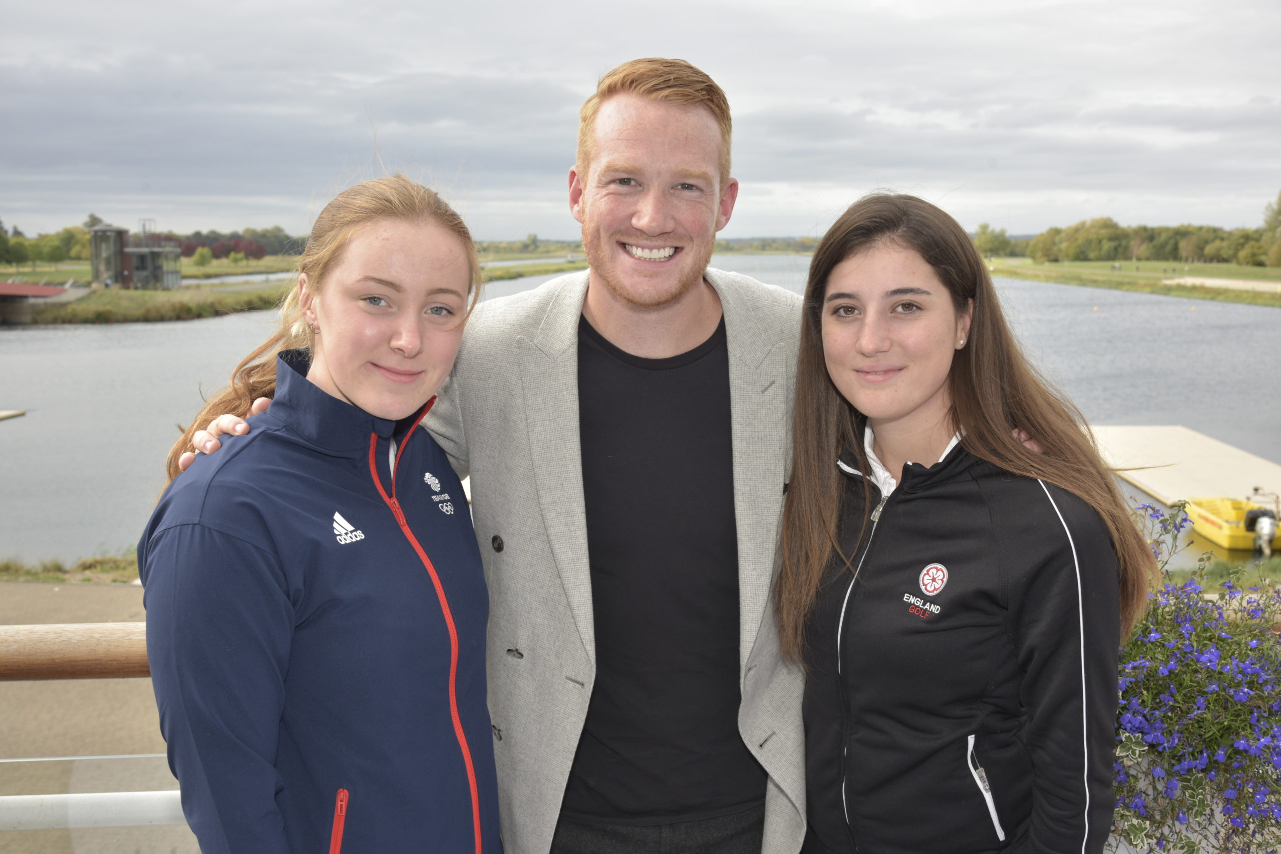 Greg Rutherford leaps to the aid of two teenage Bucks athletes ...